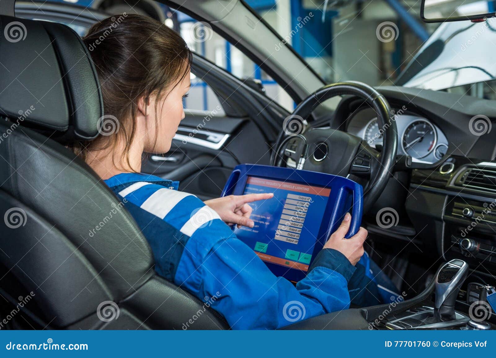 Mechanic Using Tablet Computer in Car at Garage Stock Photo - Image of ...