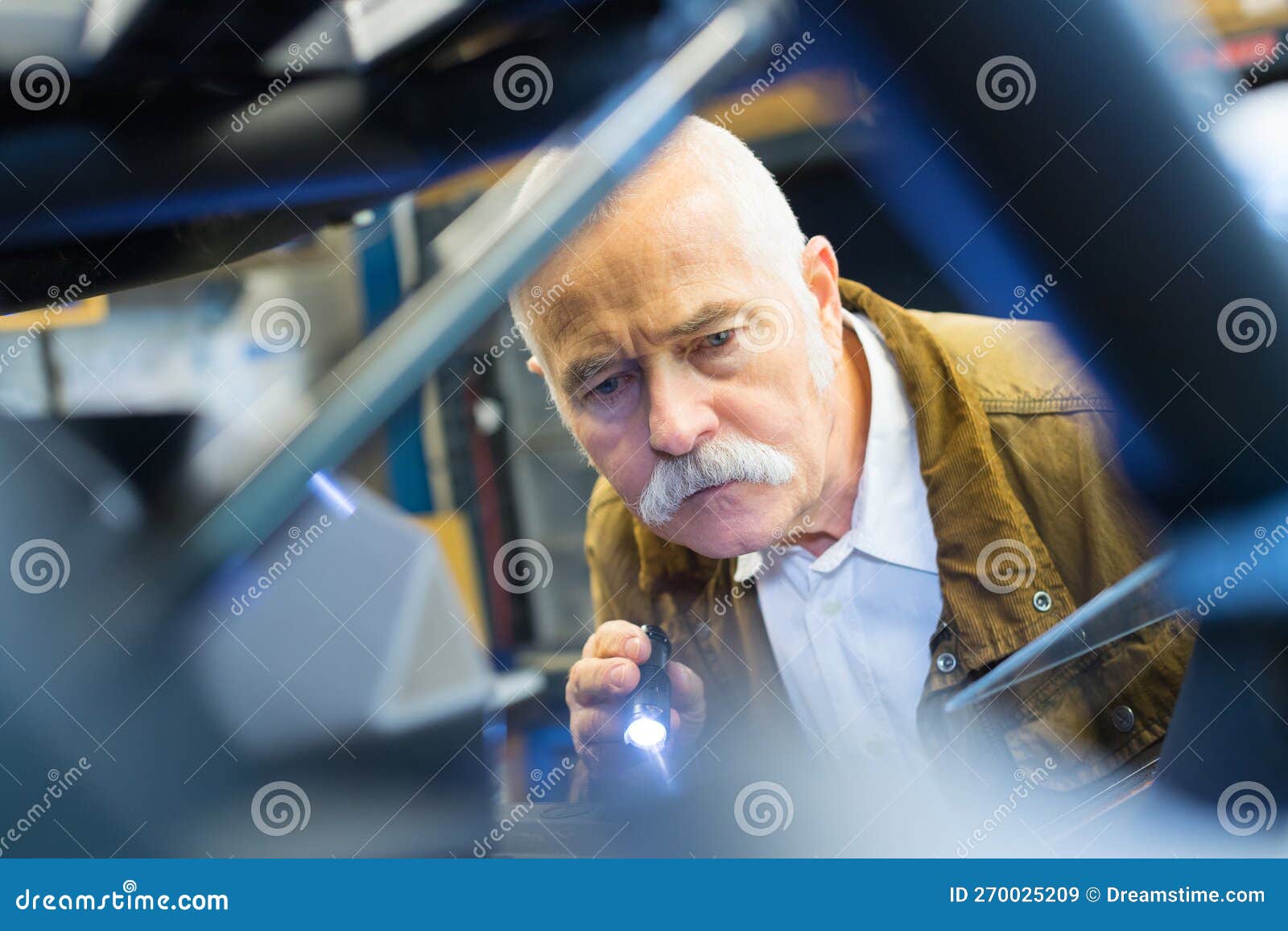 Mechanic Using Torch To Inspect Vehicle Stock Image - Image of ...