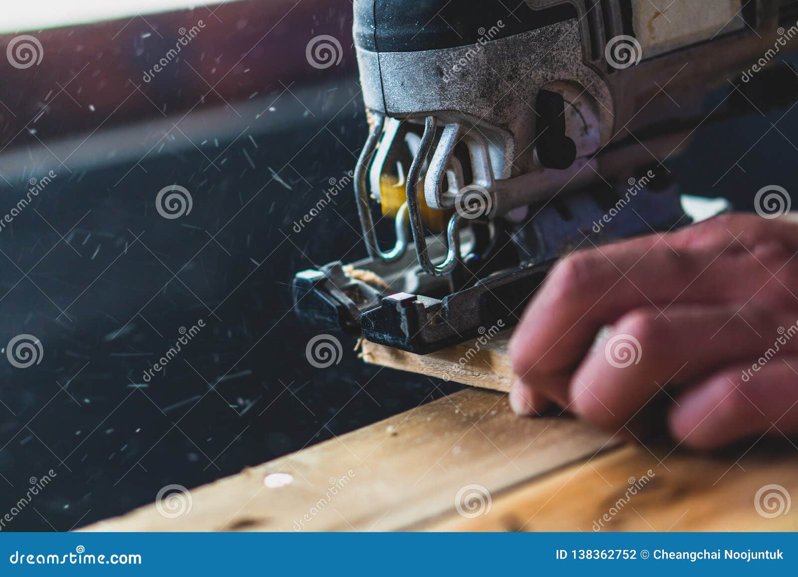 The Mechanic is Using Wood Cutting Tools in Construction Stock Photo ...