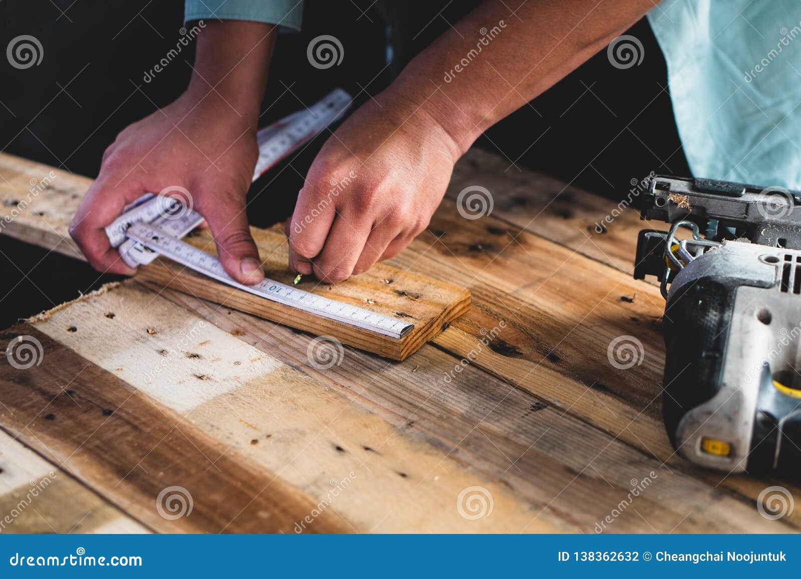The Mechanic is Using Wood Cutting Tools in Construction Stock Photo ...