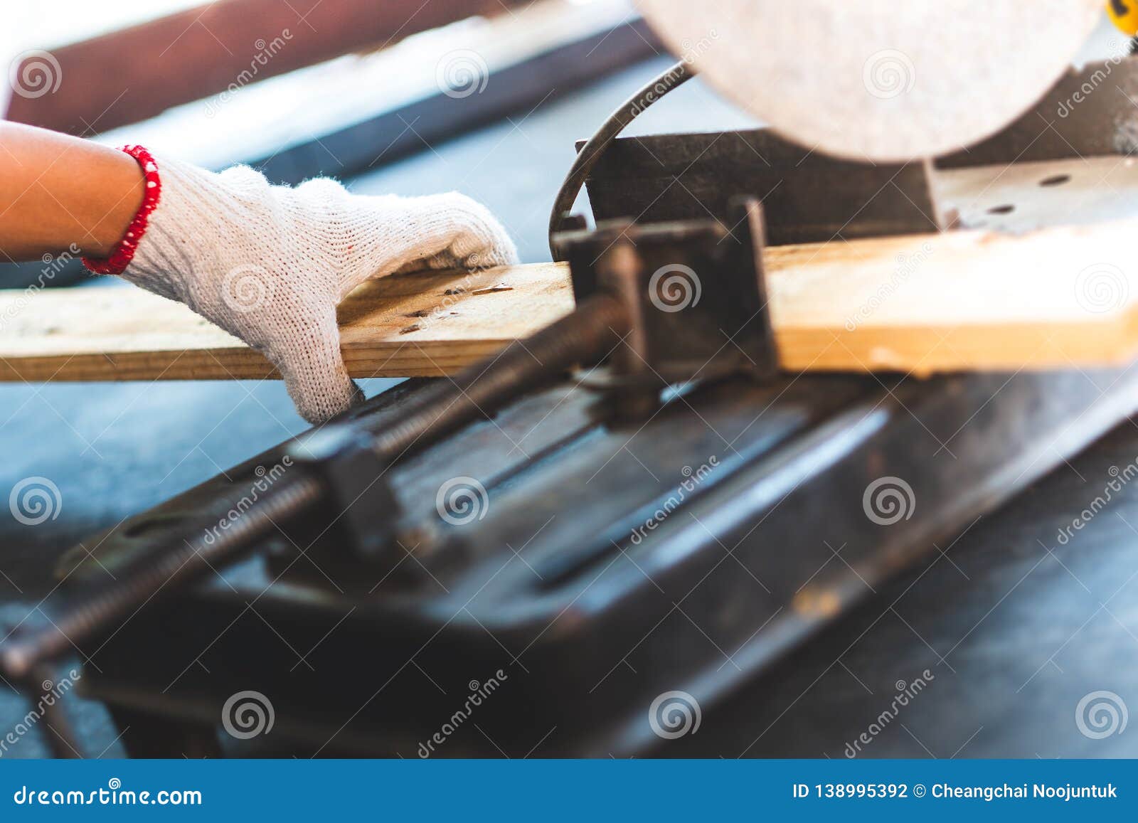 The Mechanic is Using Wood Cutting Tools in Construction Stock Photo ...