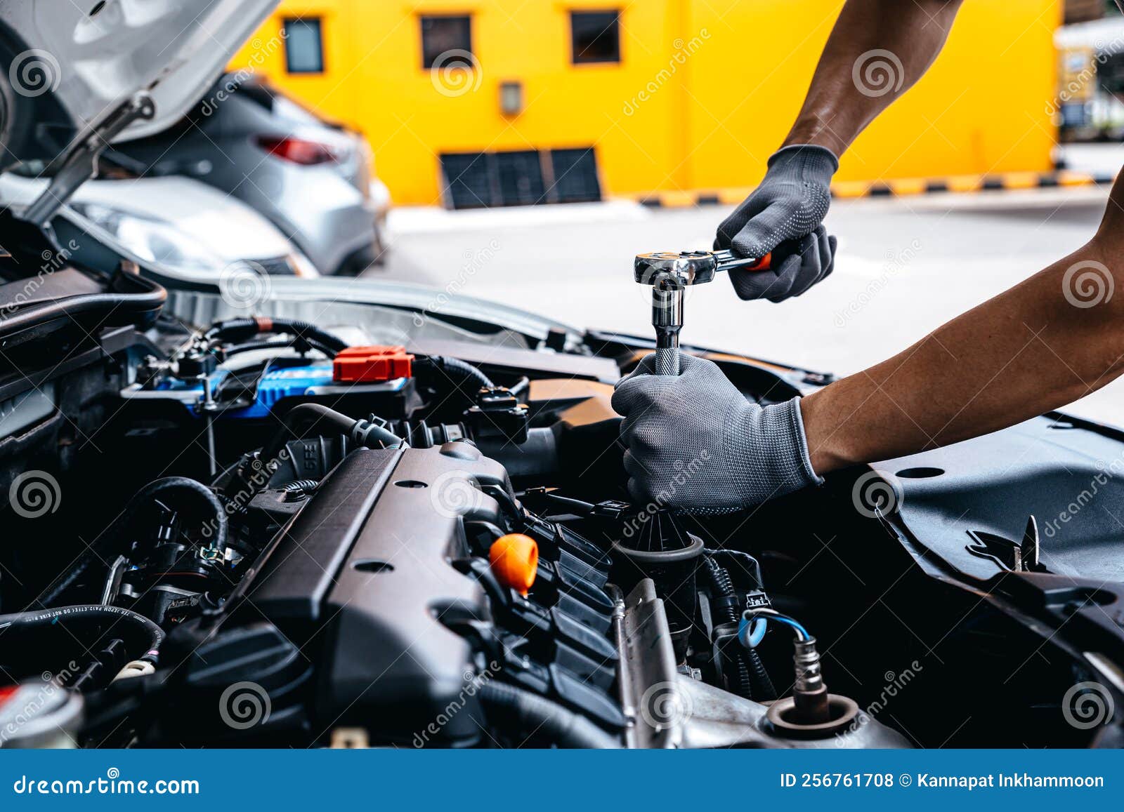 Mechanic Using Wrench while Working on Car Engine at Garage Workshop ...