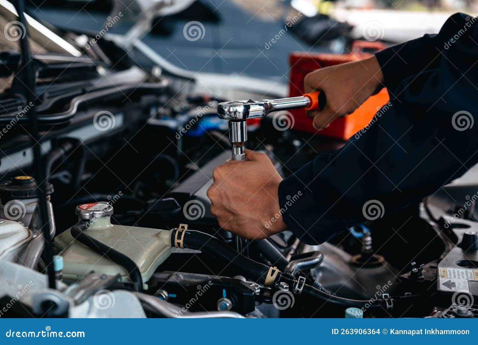 Mechanic Using Wrench while Working on Car Engine at Garage Workshop ...