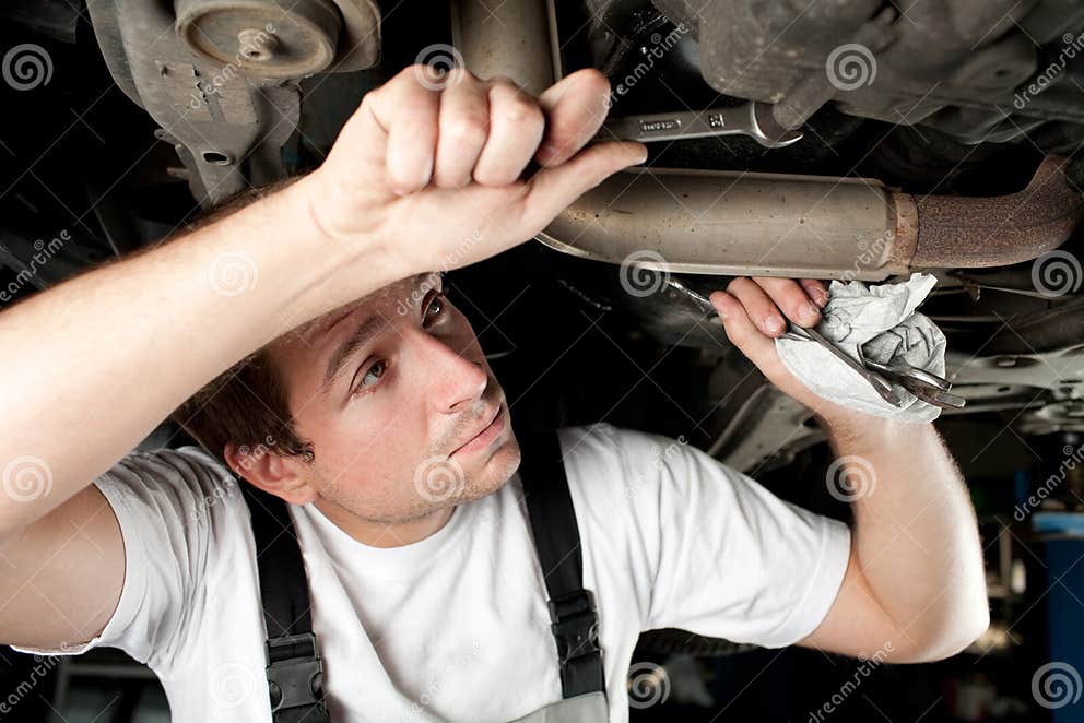 Mechanic at work stock image. Image of person, work, automobile - 10690503