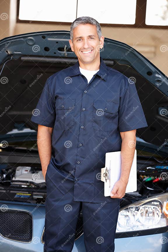 Mechanic at work stock image. Image of repairing, happy - 21038403
