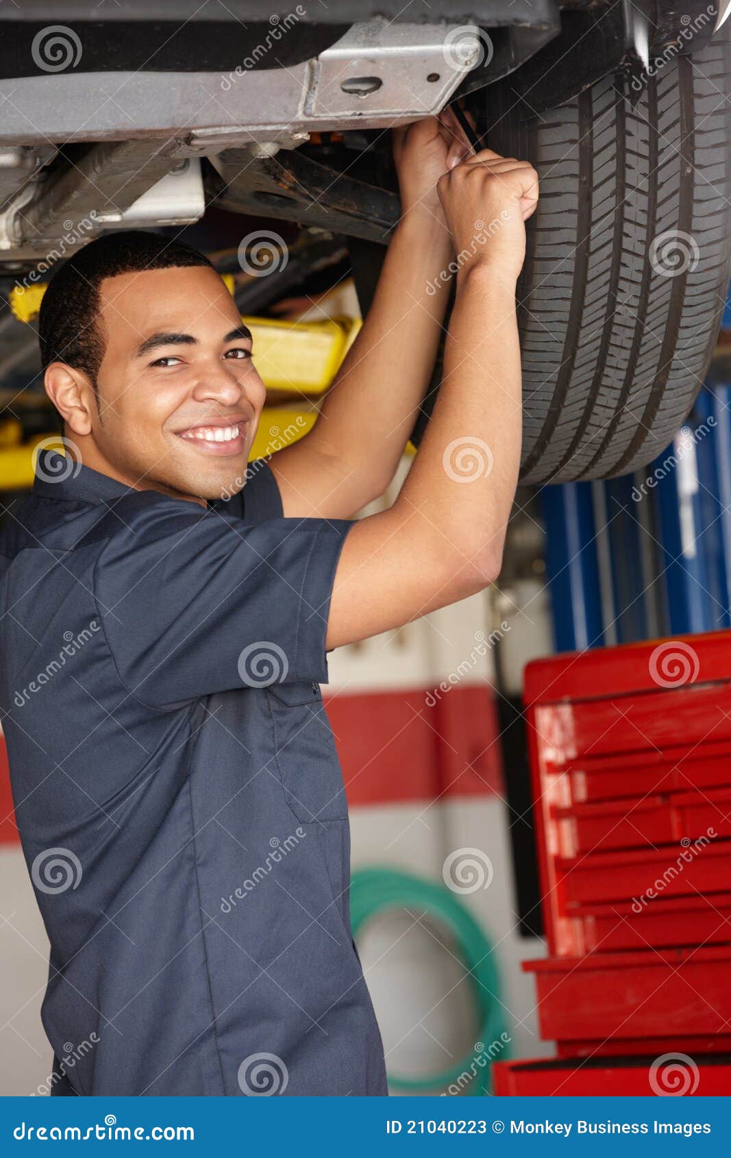 Mechanic at work stock image. Image of replacemant, repair - 21040223