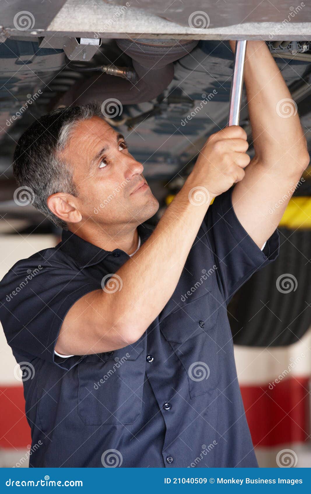 Mechanic at work stock image. Image of indoors, portrait - 21040509