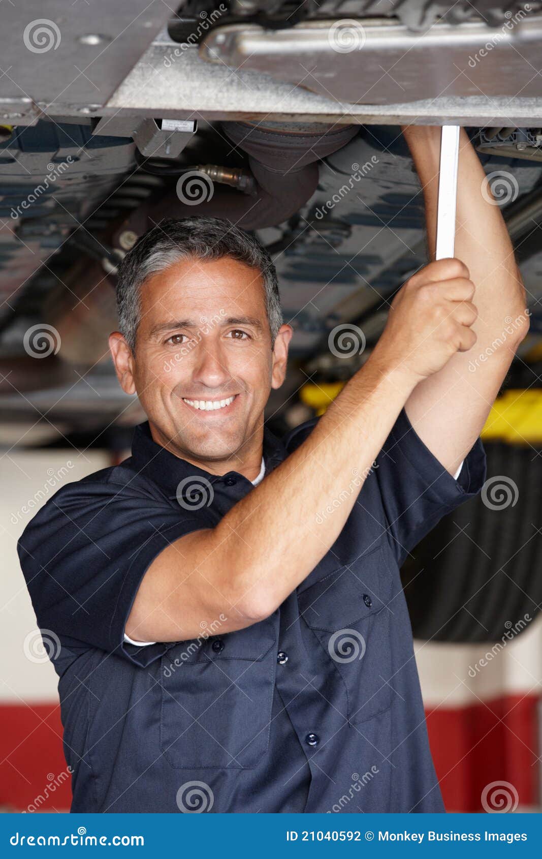 Mechanic at work stock photo. Image of garage, vertical - 21040592