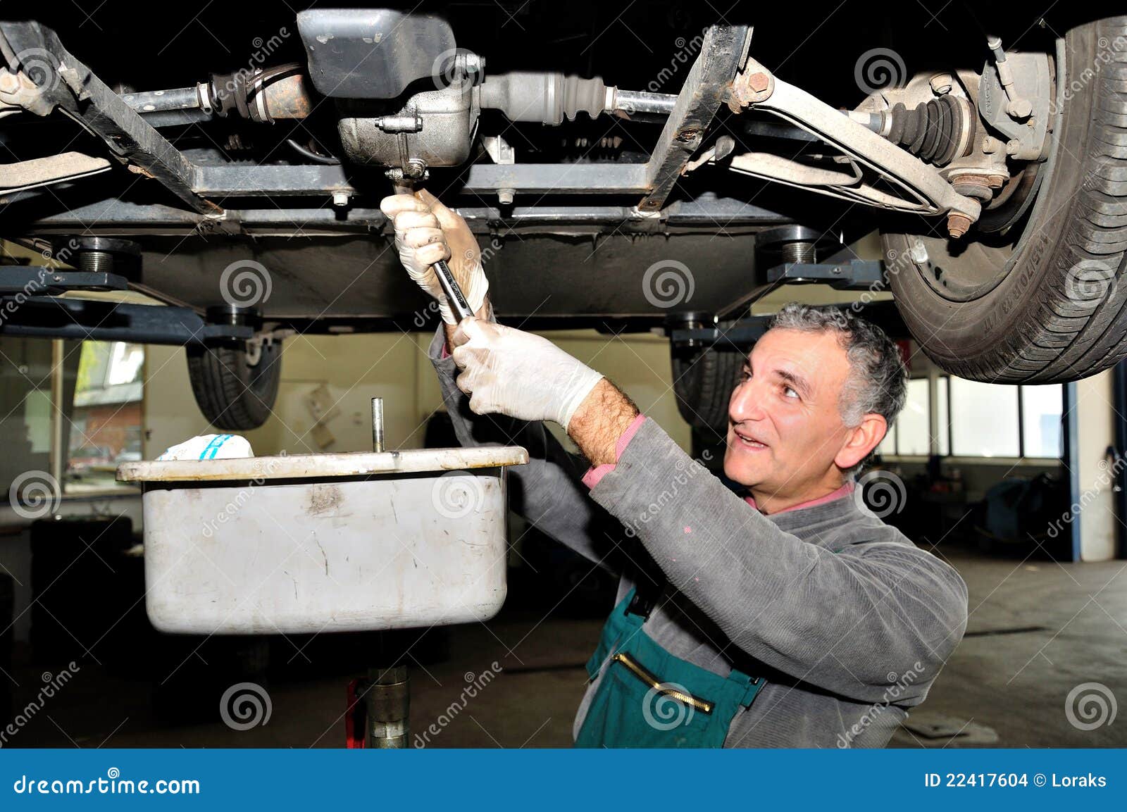 Mechanic at work. stock photo. Image of handymen, handy - 22417604