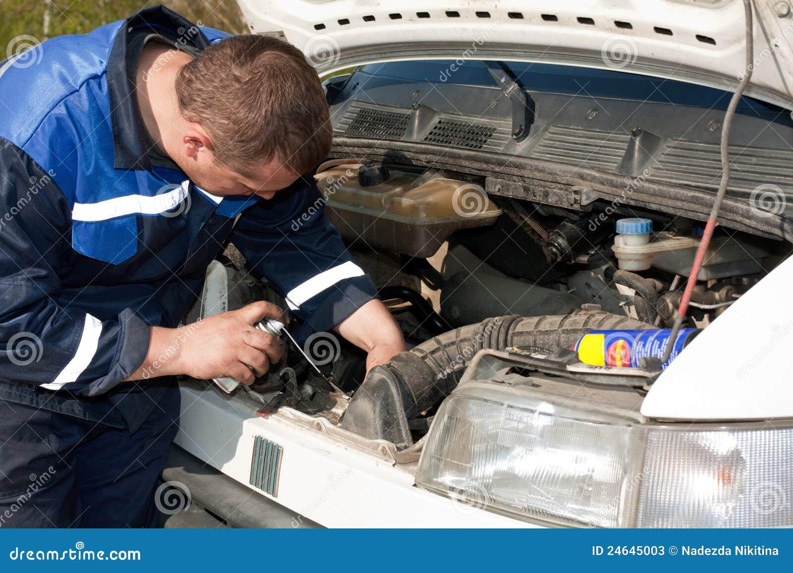 Mechanic at work stock image. Image of serious, fixing - 24645003