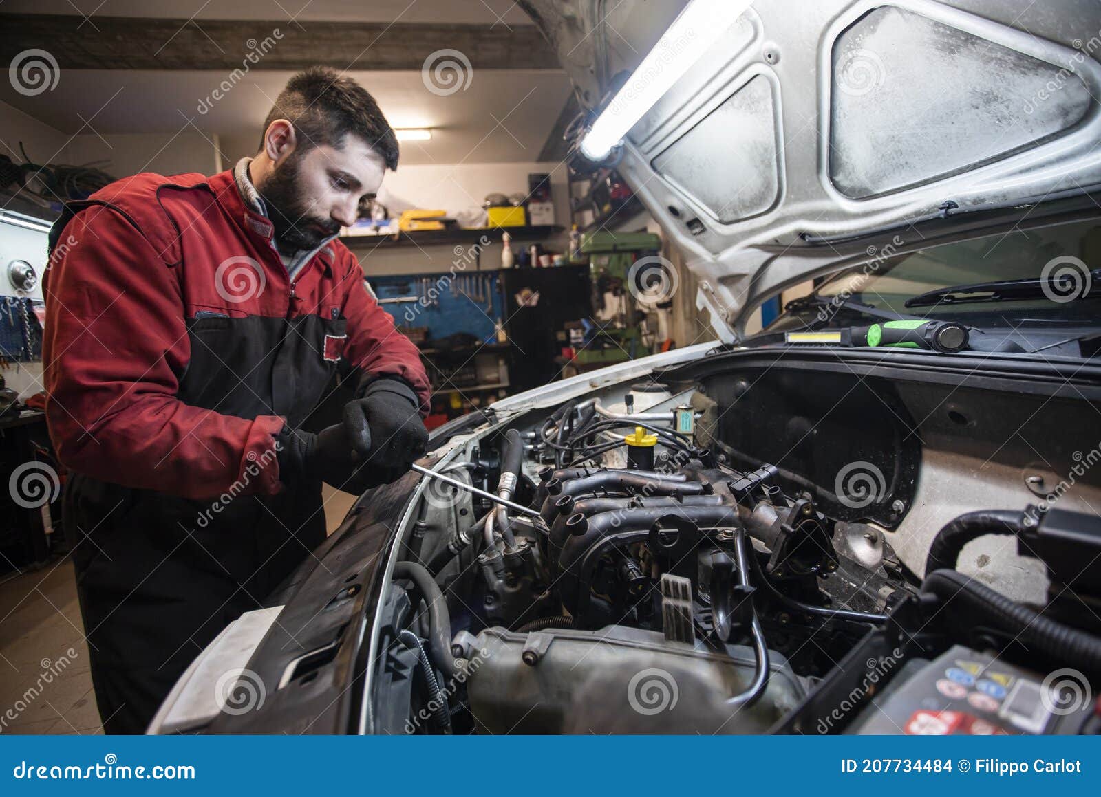 Mechanic at Work on the Engine 7 Stock Photo - Image of mechanic, male ...