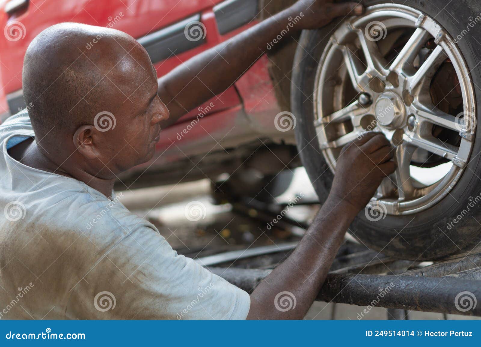 Mechanic Working in Auto Repair Shop Stock Photo - Image of labor ...