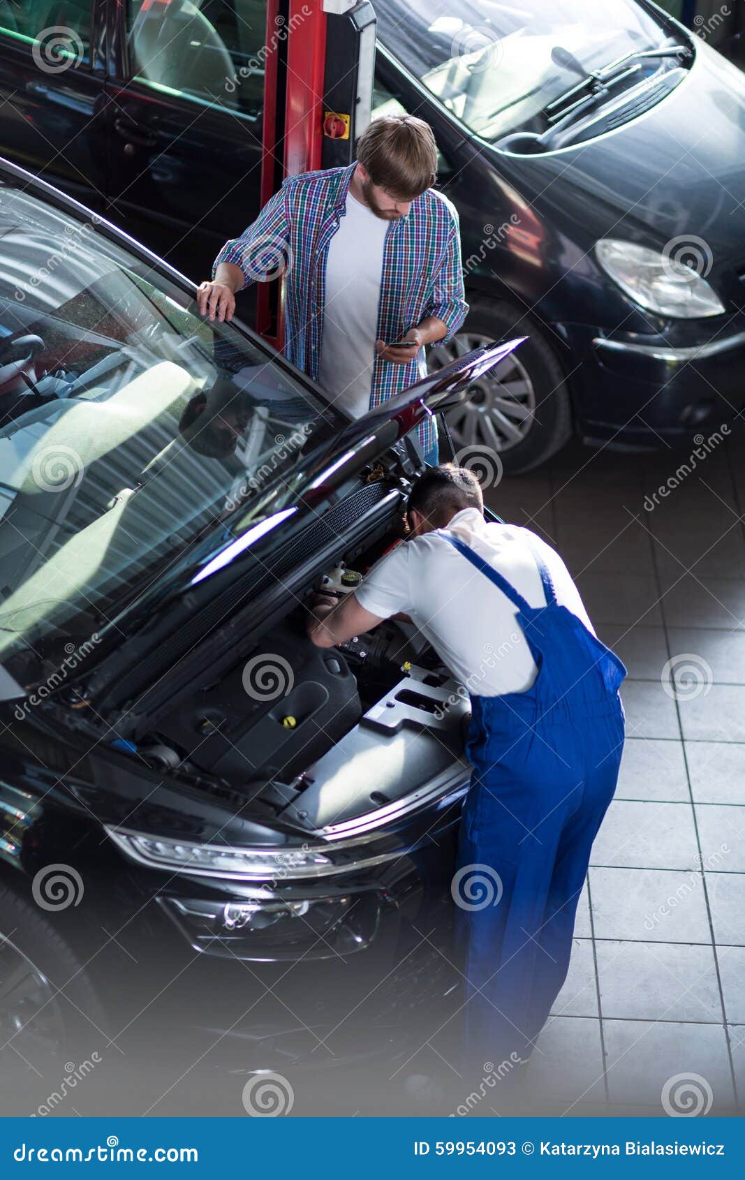 Mechanic Working on Broken Engine Stock Image - Image of equipment ...