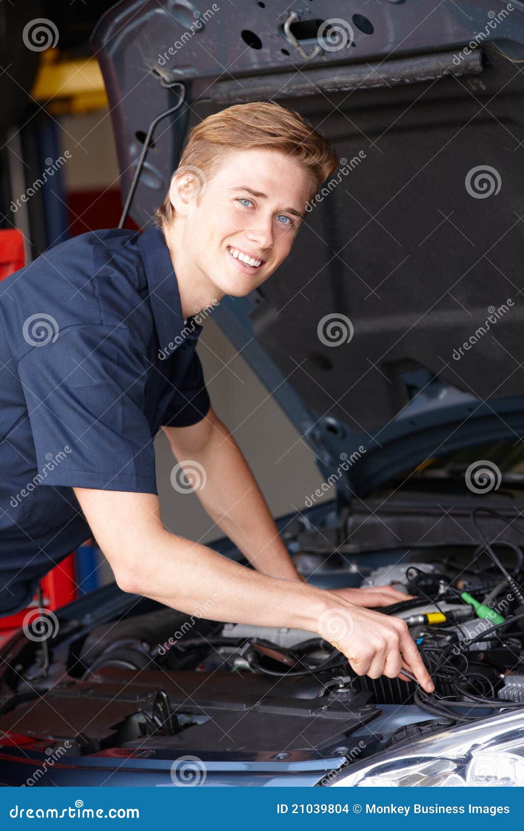 Mechanic working on car stock photo. Image of mechanic - 21039804