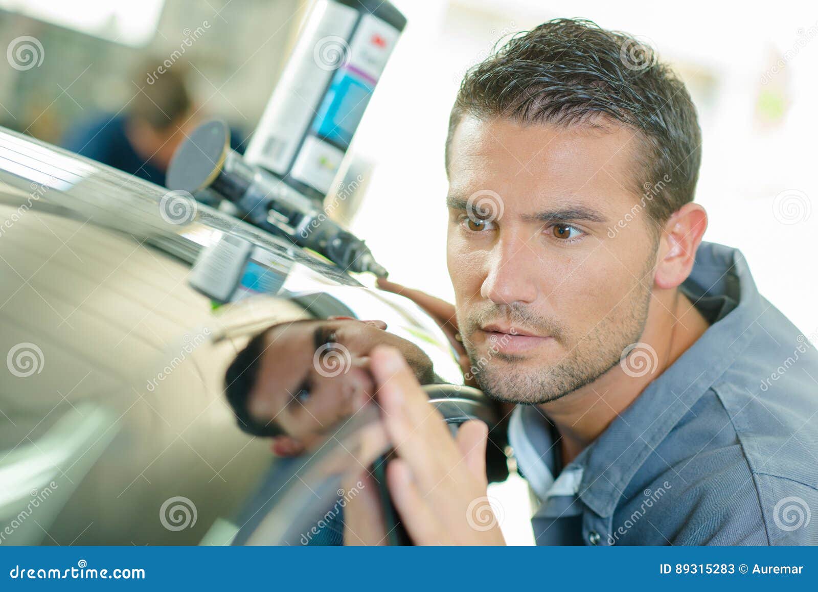 Mechanic working on car stock image. Image of wrench - 89315283