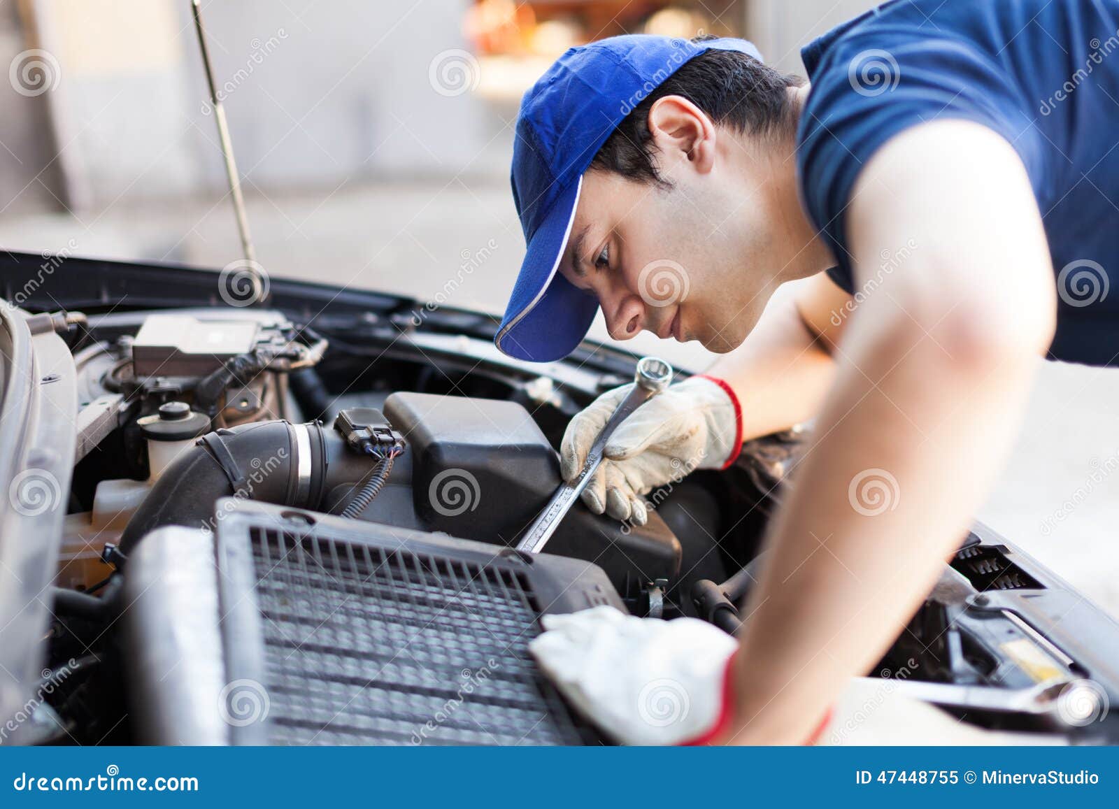 Mechanic Working on a Car Engine Stock Image - Image of working ...