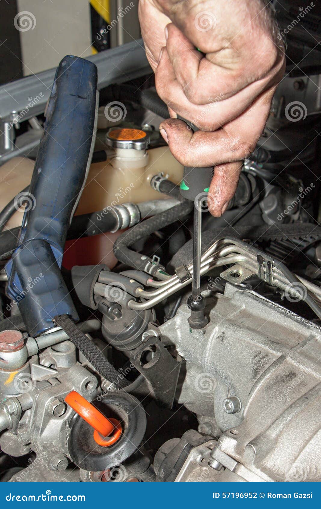 Mechanic working on engine stock photo. Image of energy - 57196952