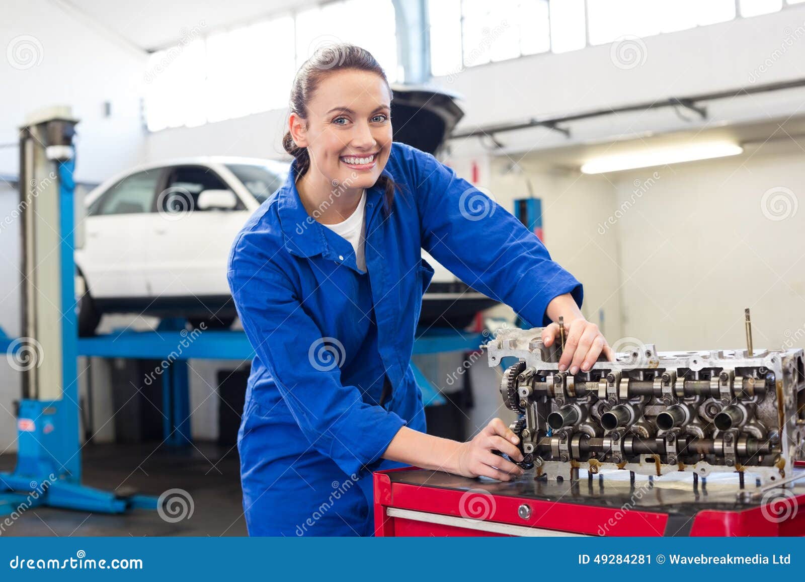 Mechanic Working on an Engine Stock Image - Image of service, indoors ...
