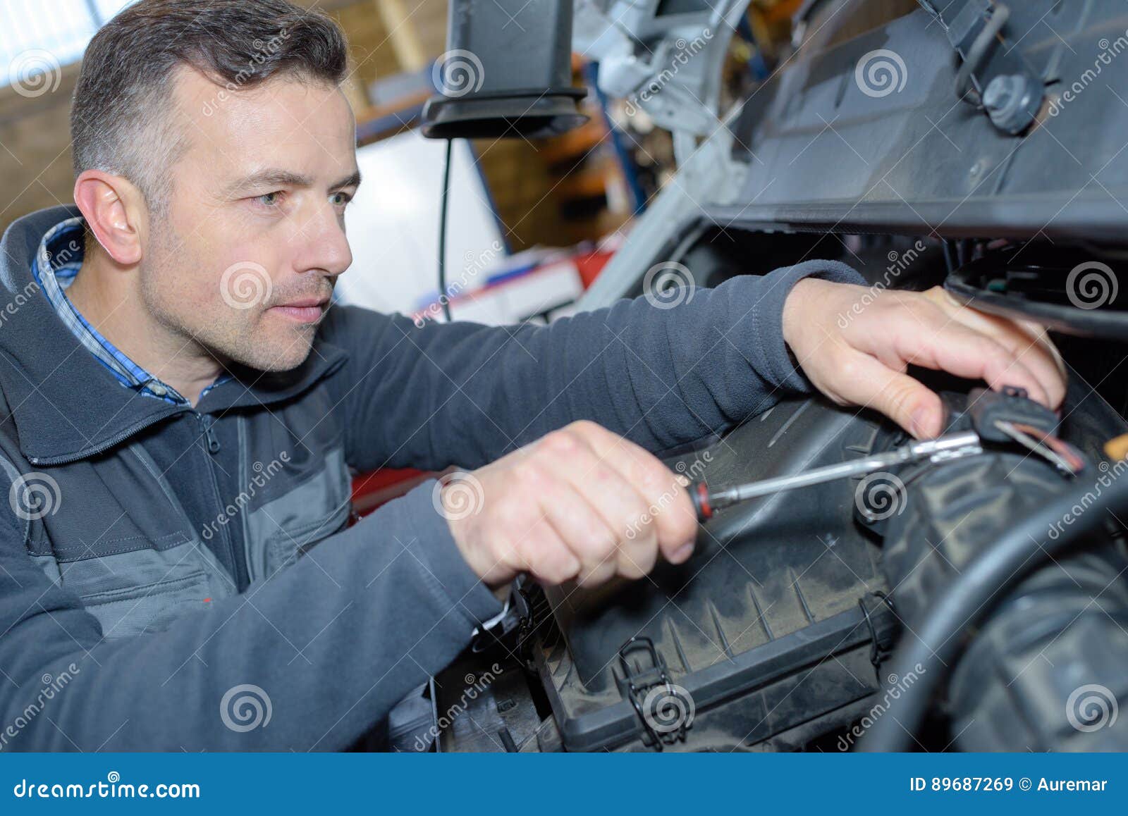 Mechanic Working on Engine at Repair Garage Stock Image - Image of ...
