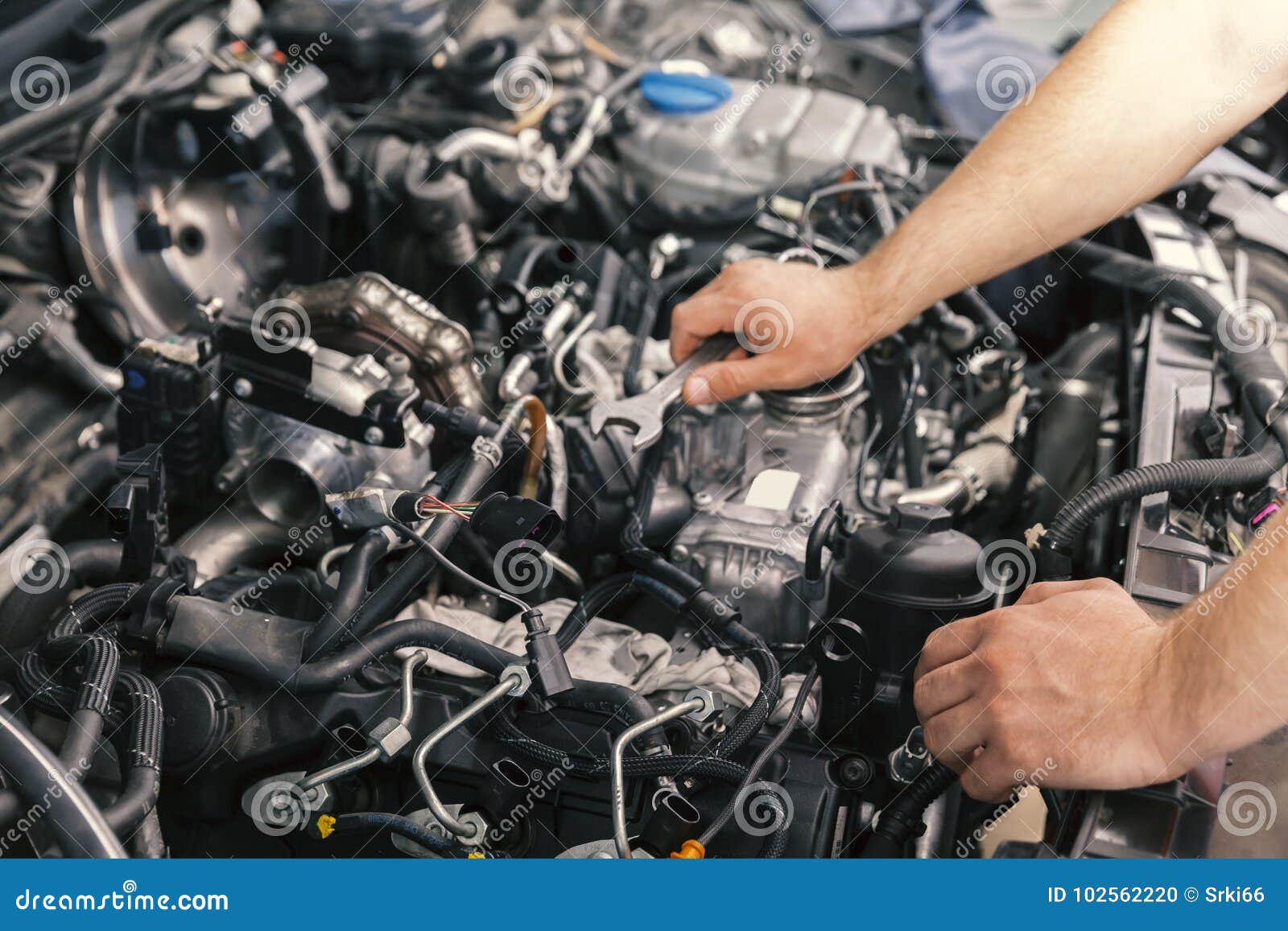 Mechanic Working on Engine Repairs Stock Photo - Image of auto ...