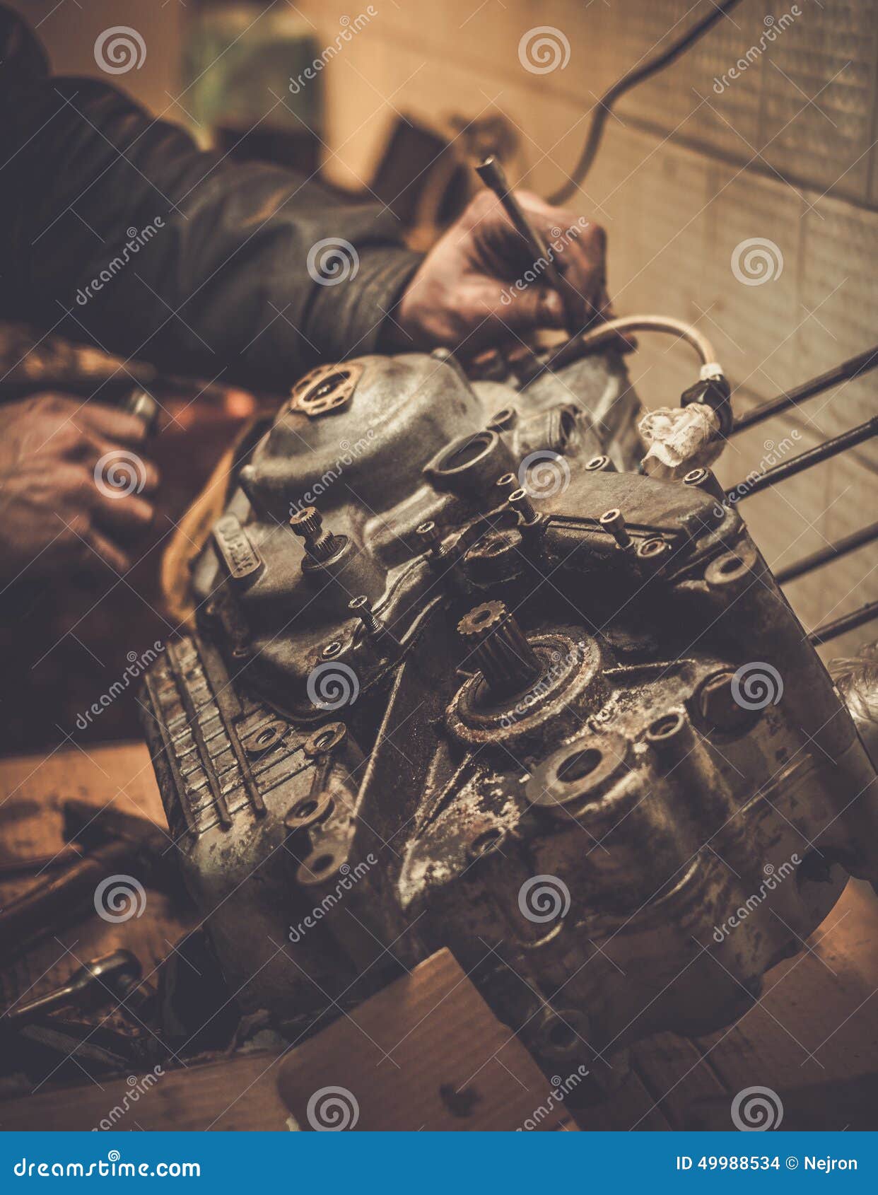 Mechanic Working with with Motorcycle Engine Stock Photo - Image of ...