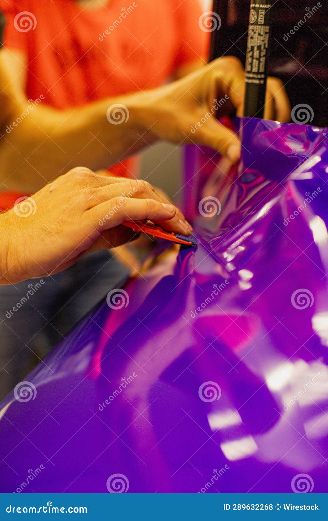 Mechanic Working on a Purple Automobile Stock Photo - Image of garage ...