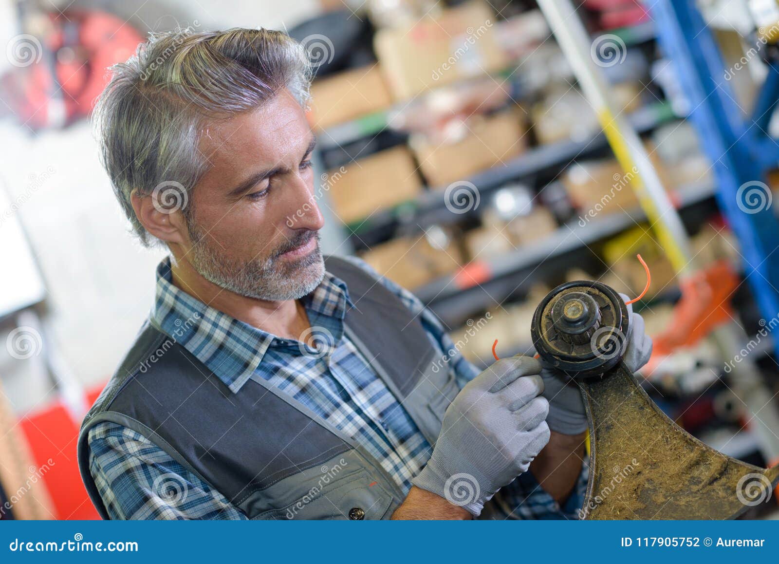 Mechanic Working on Strimmer Head Stock Photo - Image of motor, head ...