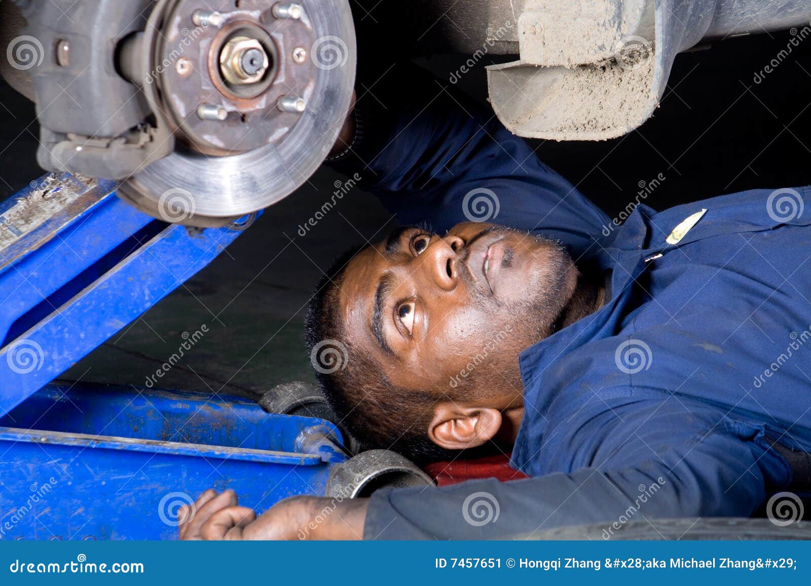 Mechanic Working Under a Car Stock Image - Image of fixing, industrial ...