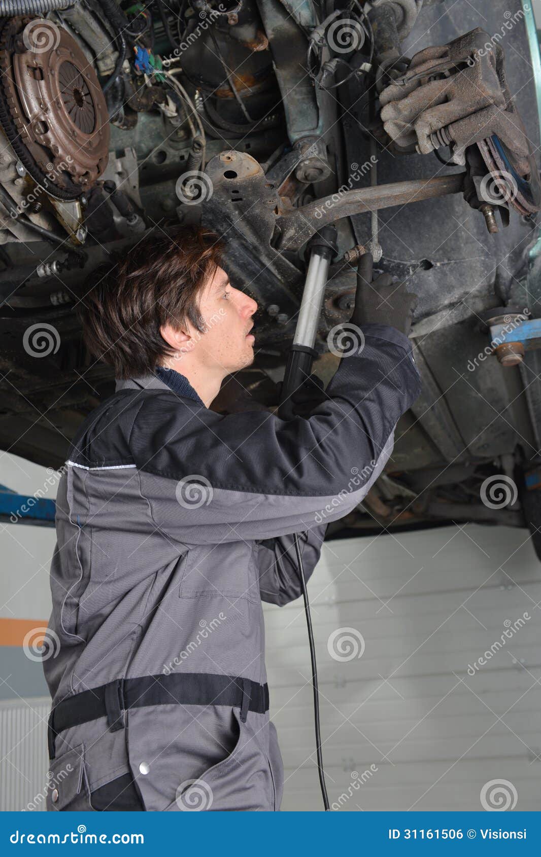 Mechanic Working Under the Car Stock Photo - Image of small, working ...