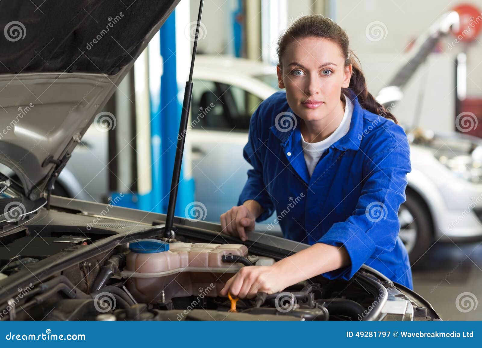 Mechanic Working Under the Hood Stock Image - Image of manual ...