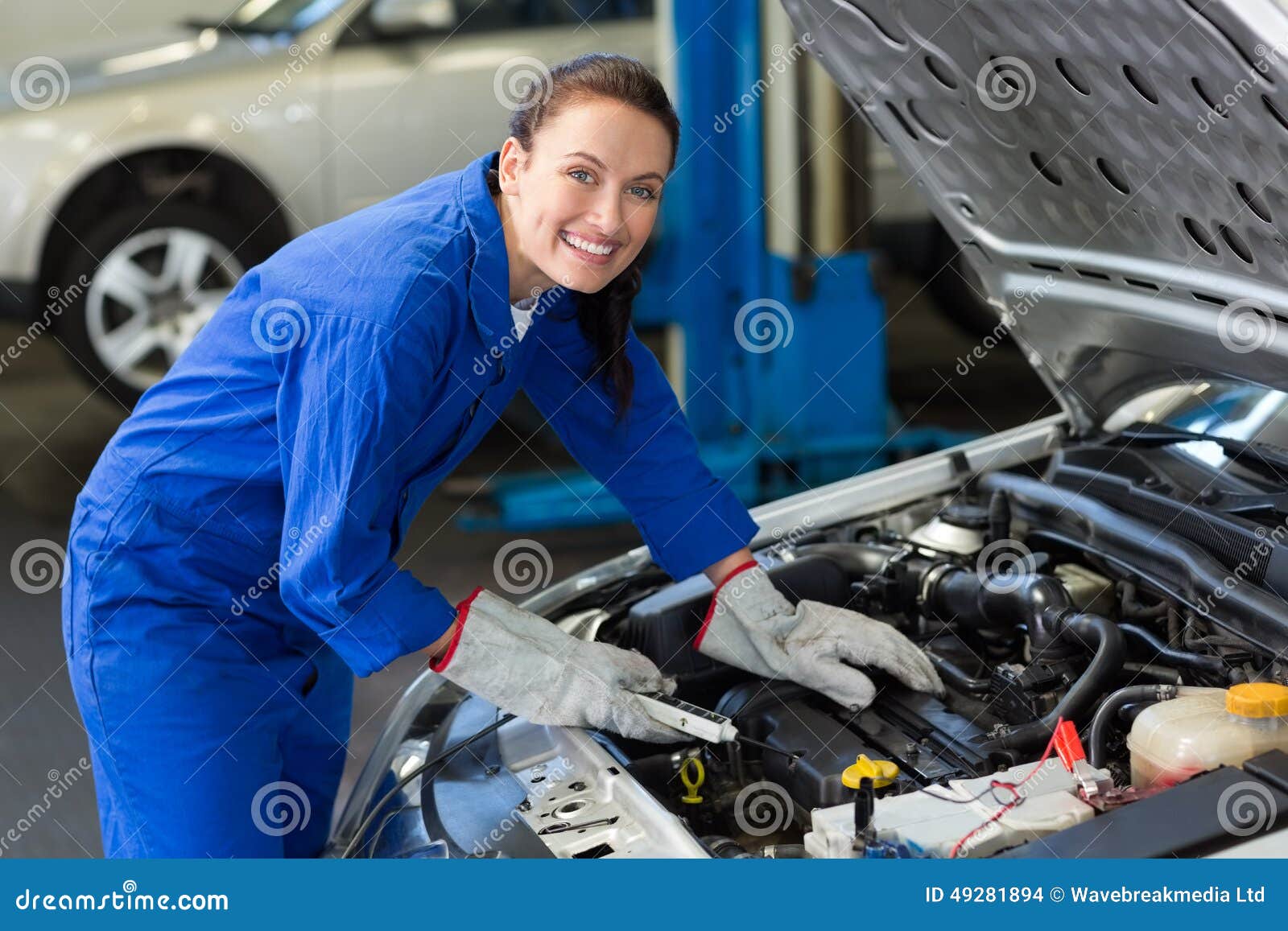 Mechanic Working Under the Hood Stock Photo - Image of engine, smiling ...
