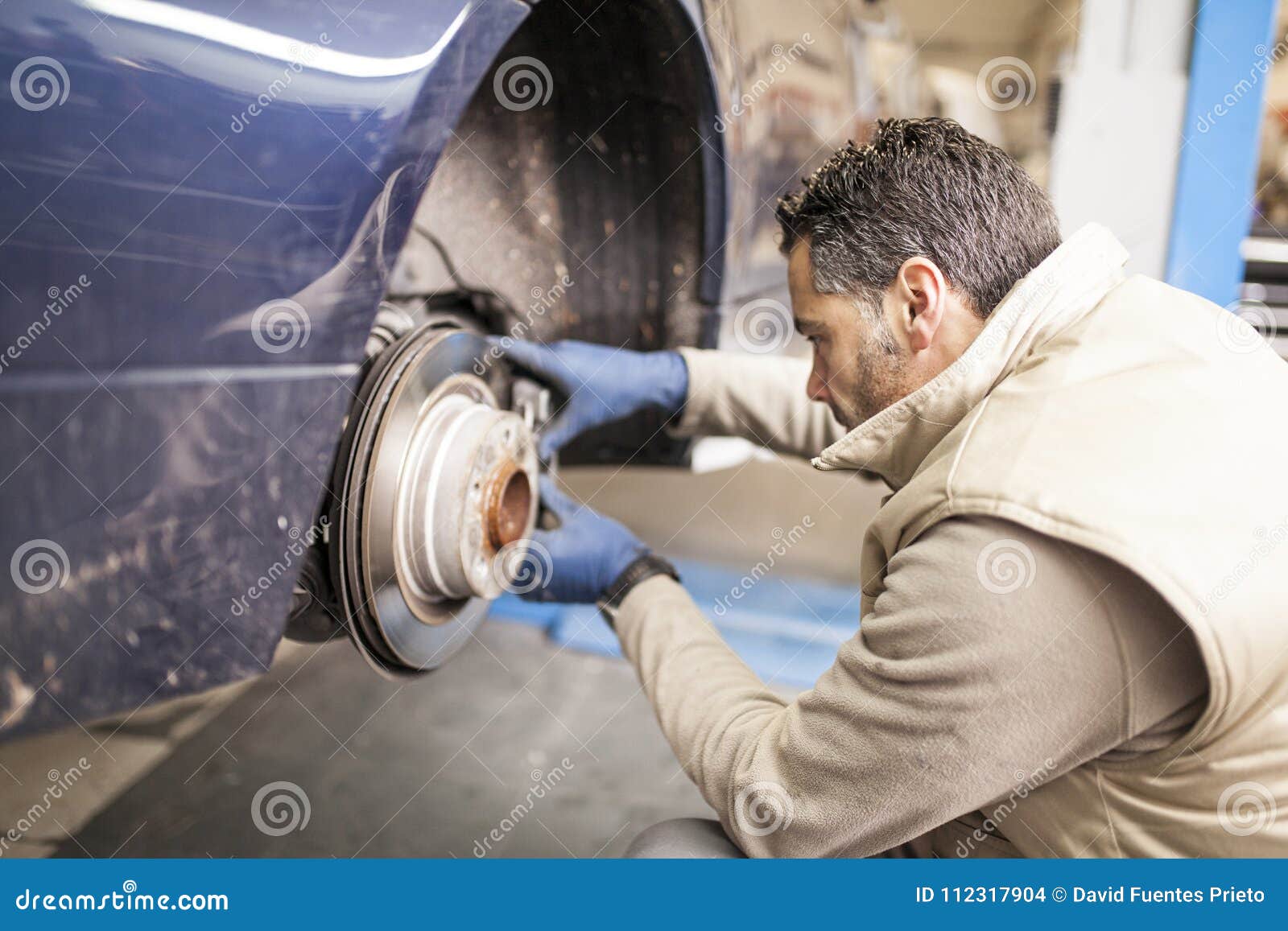 The Mechanic Works in the Workshop Stock Photo - Image of close ...