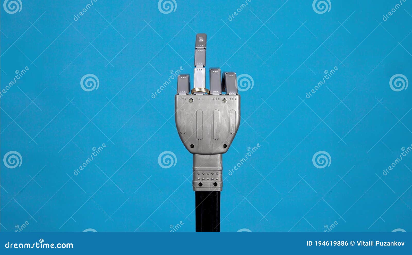 A Mechanical Arm Bends Fingers and Shows a Ring Finger with a Ring ...