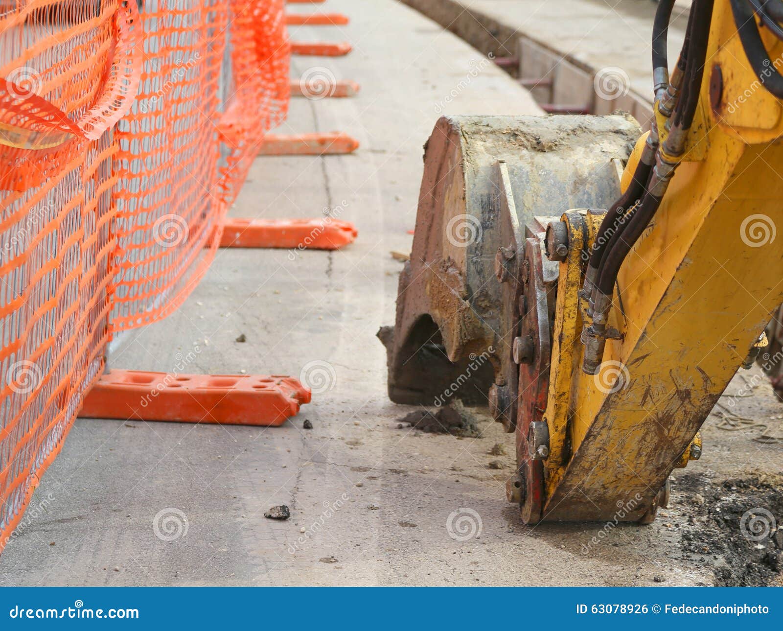 Mechanical Arm of the Excavator Digging on the Road Stock Photo - Image ...