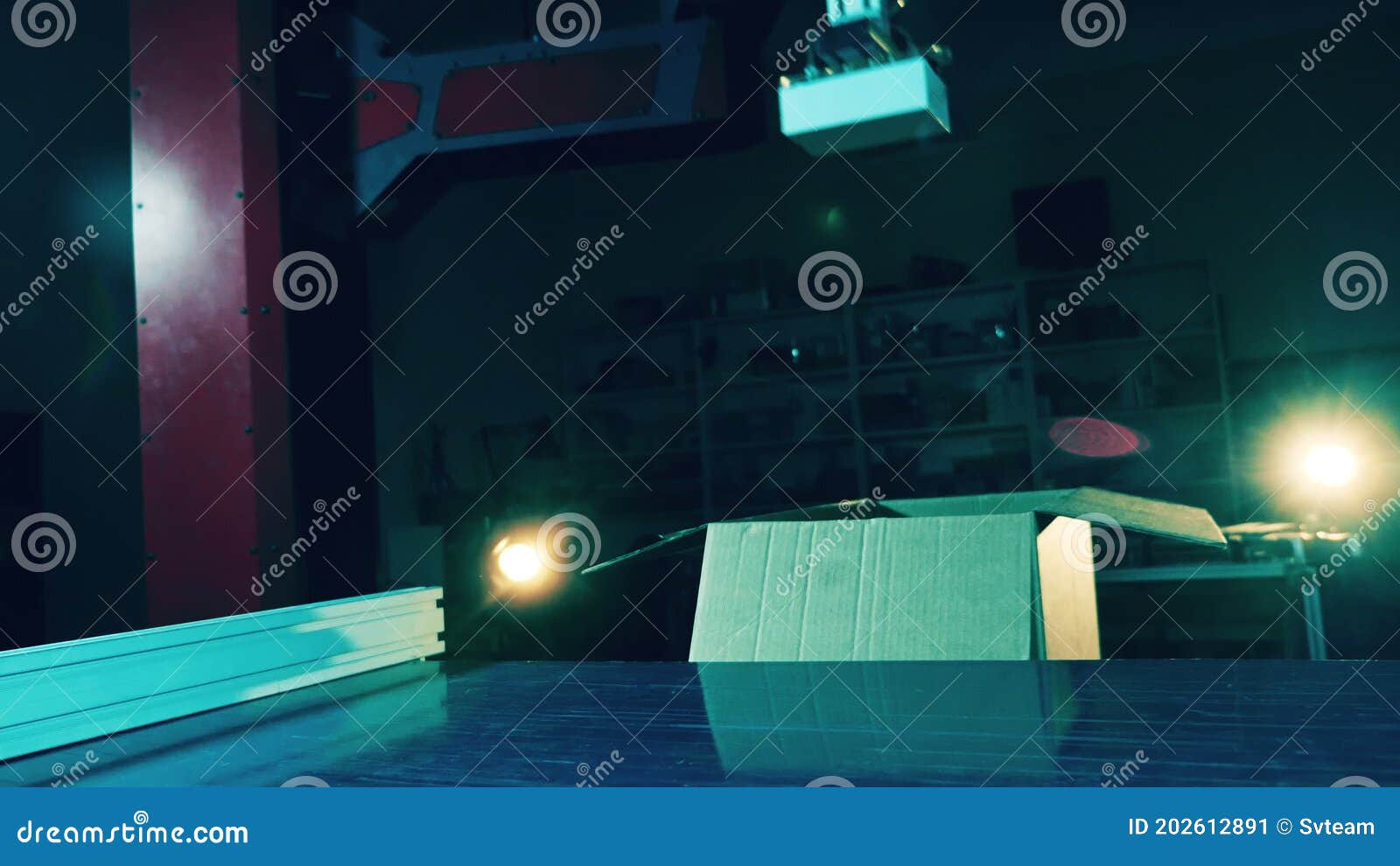 Mechanical Device is Putting a Package into a Box Stock Video - Video ...