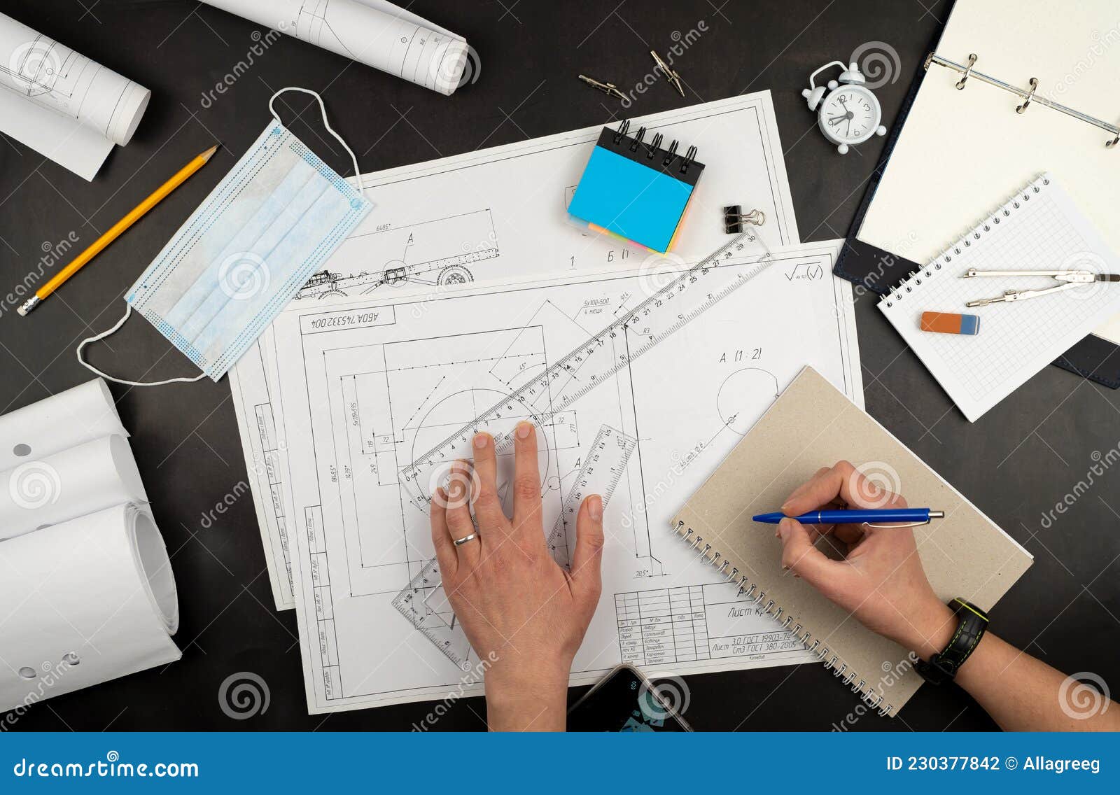 Mechanical Drawing On Sheets Of Paper. Hands On The Table Top View ...