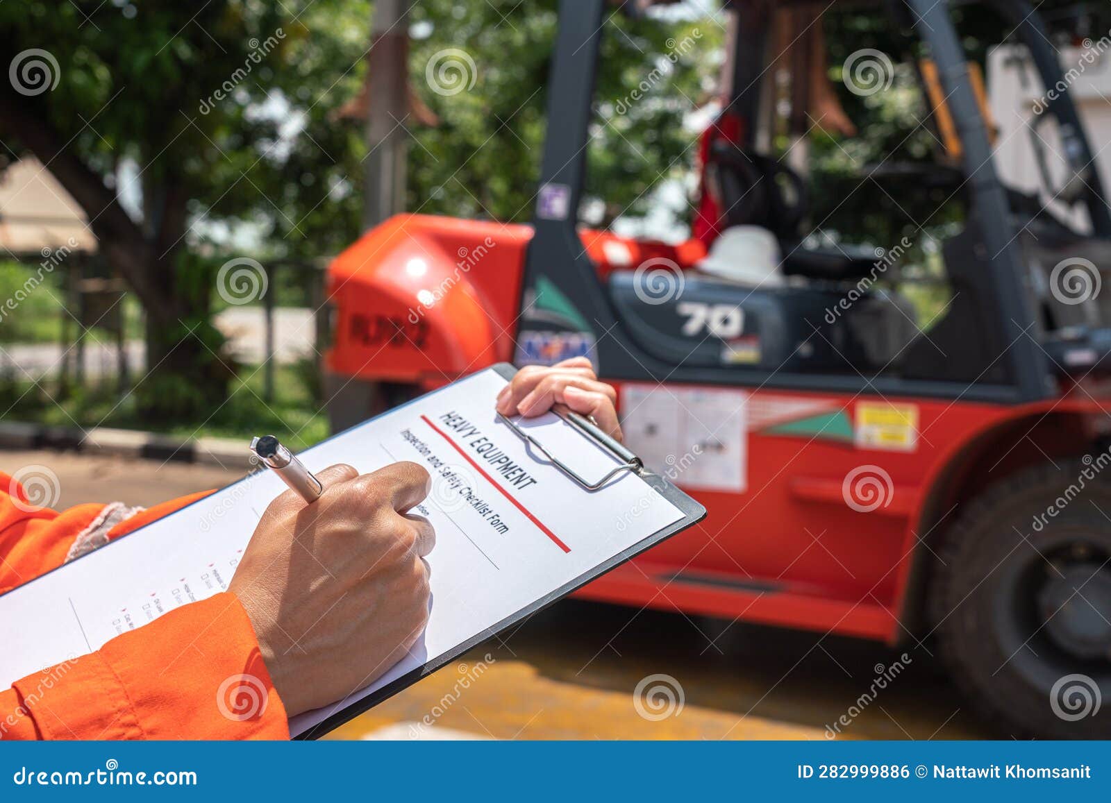 Checking on Heavy Equipment Checklist, Industrial Safety Working. Stock ...