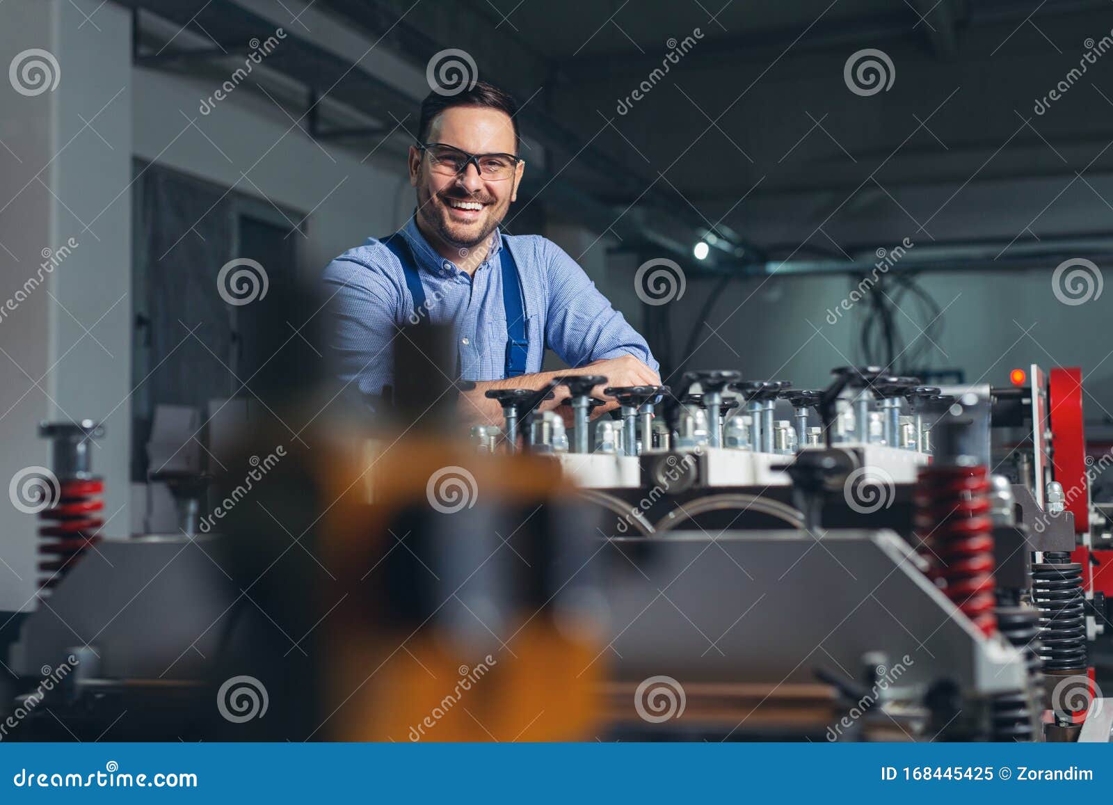 Mechanical Engineer Working on Machines. Stock Image - Image of ...