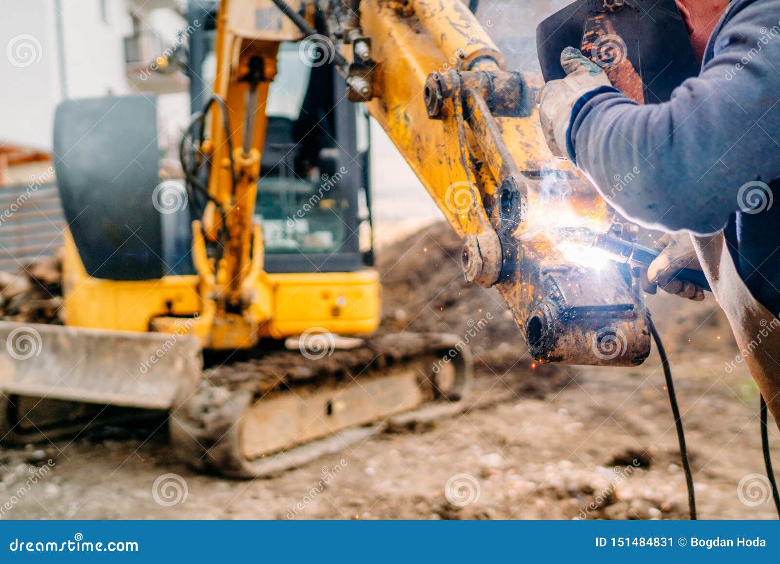 Mechanical Engineer Working and Welding Excavator Stock Image - Image ...