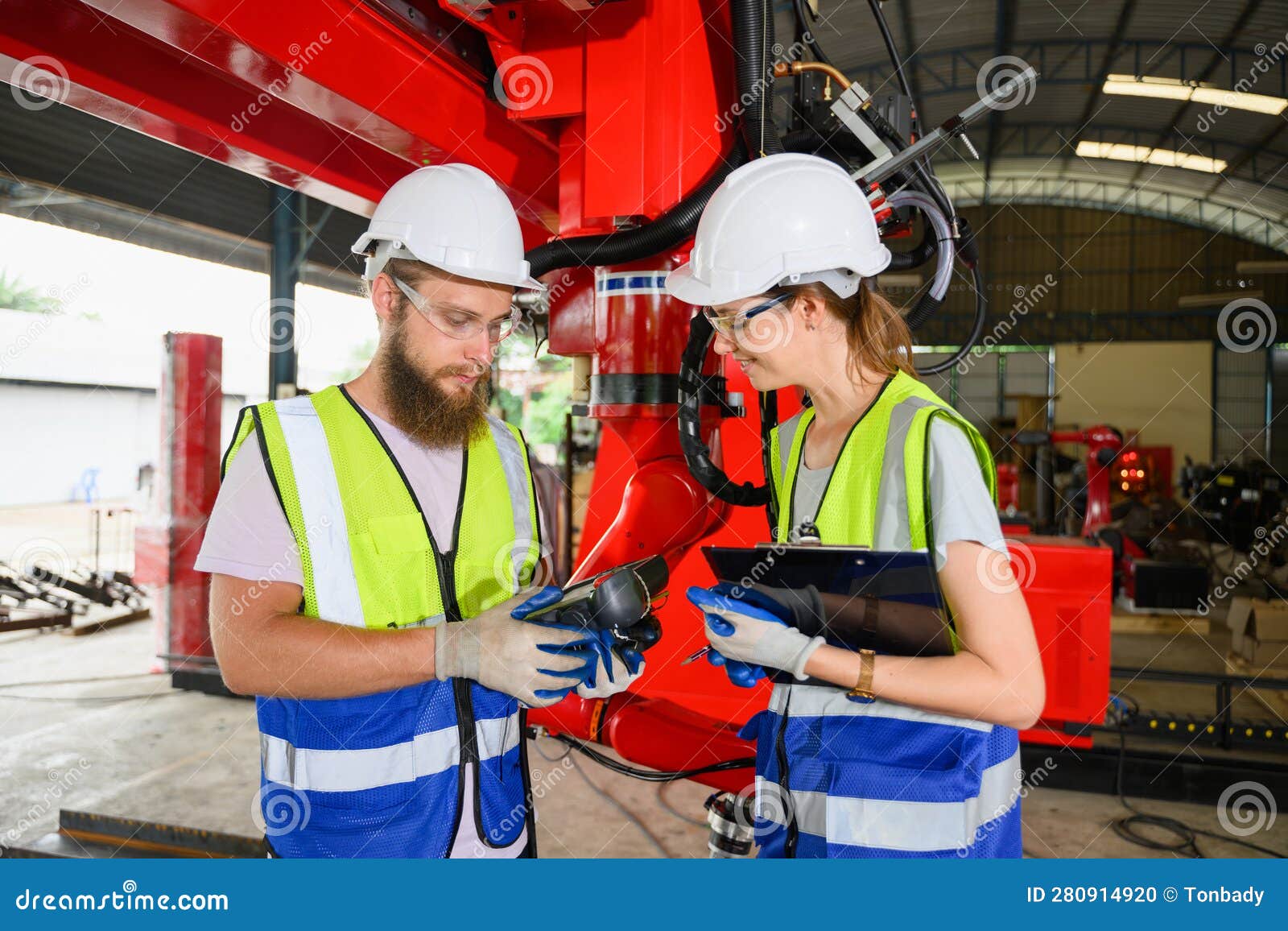 Mechanical Engineers Repairing Engine Machine at Factory Stock Photo ...