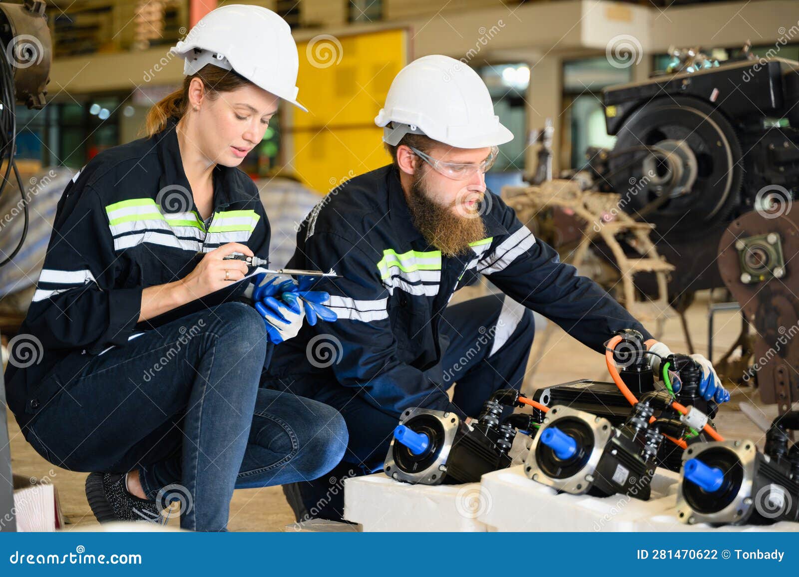 Mechanical Engineers Repairing Engine Machine at Factory Stock Photo ...