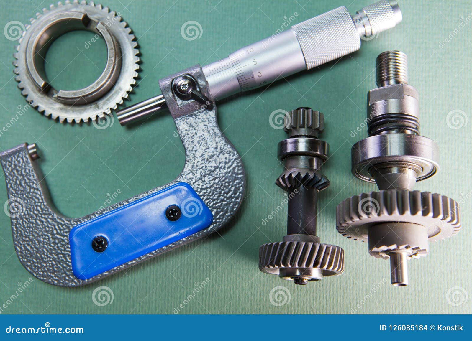Mechanical Micrometer and Detail on a Green Background Stock Photo ...