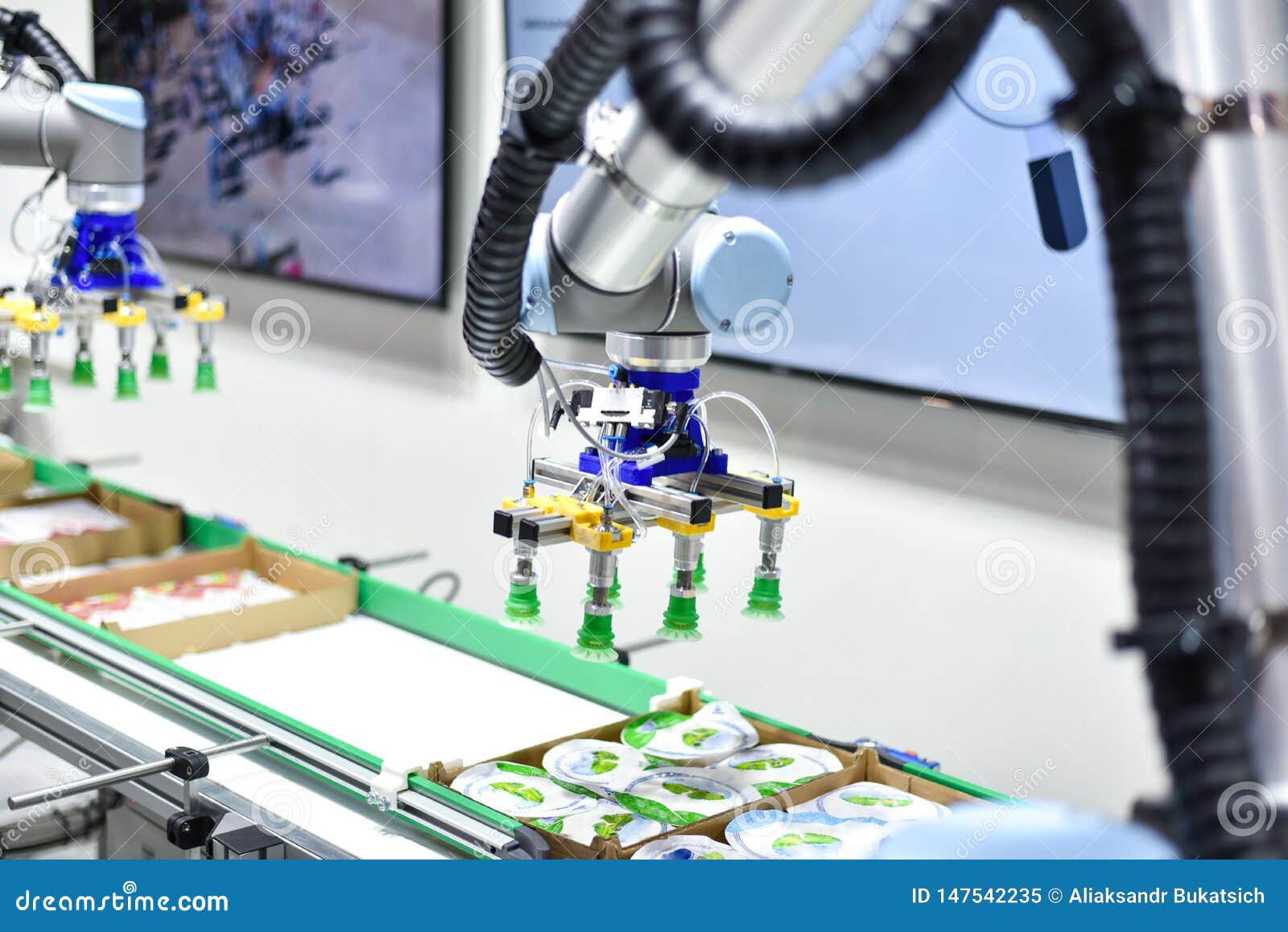 The Mechanical Arm Of The Robot Connects The Wires In The Server Room ...