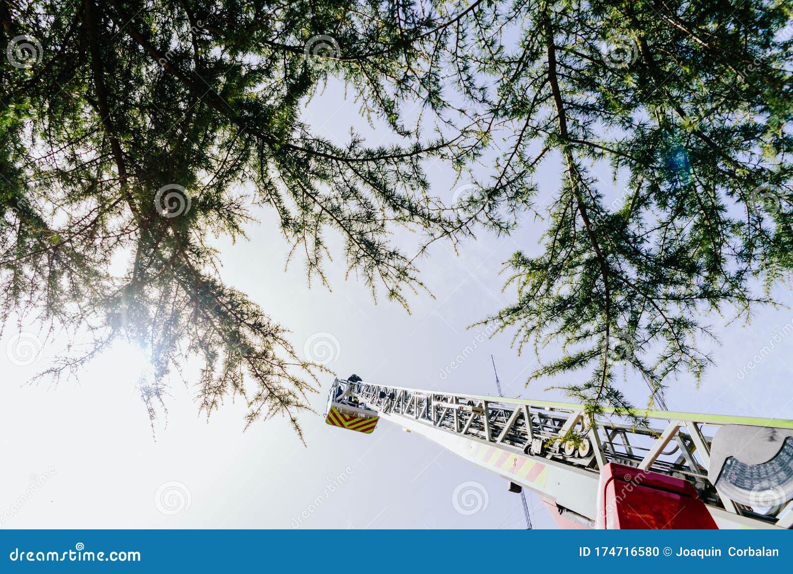 Mechanical Scale of Firefighters Seen from Below with Blue Sky in the ...