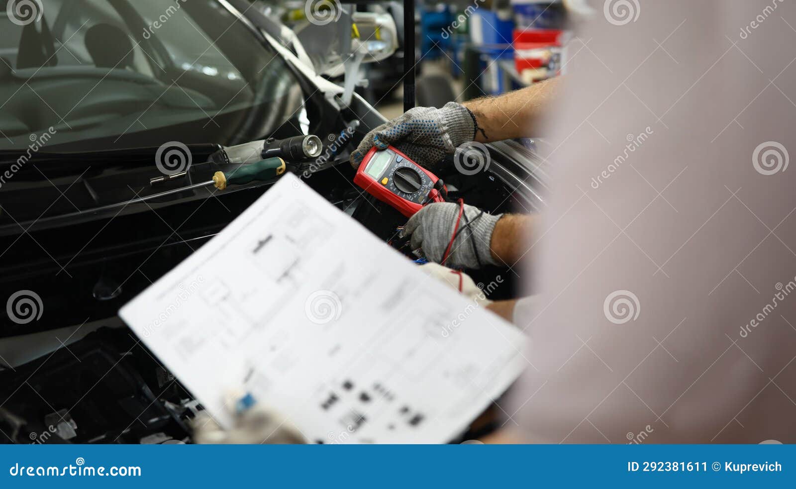 Mechanical Service Using Multimeter To Check Voltage Level in Car ...