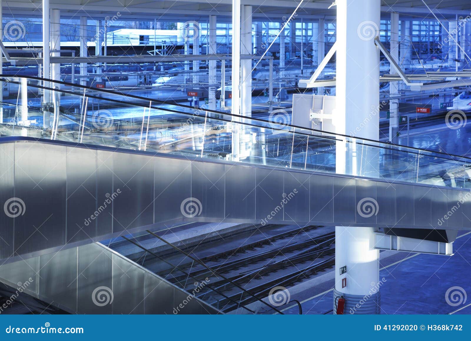 Mechanical Staircase in a Railway Station in Blue Tone Stock Photo ...
