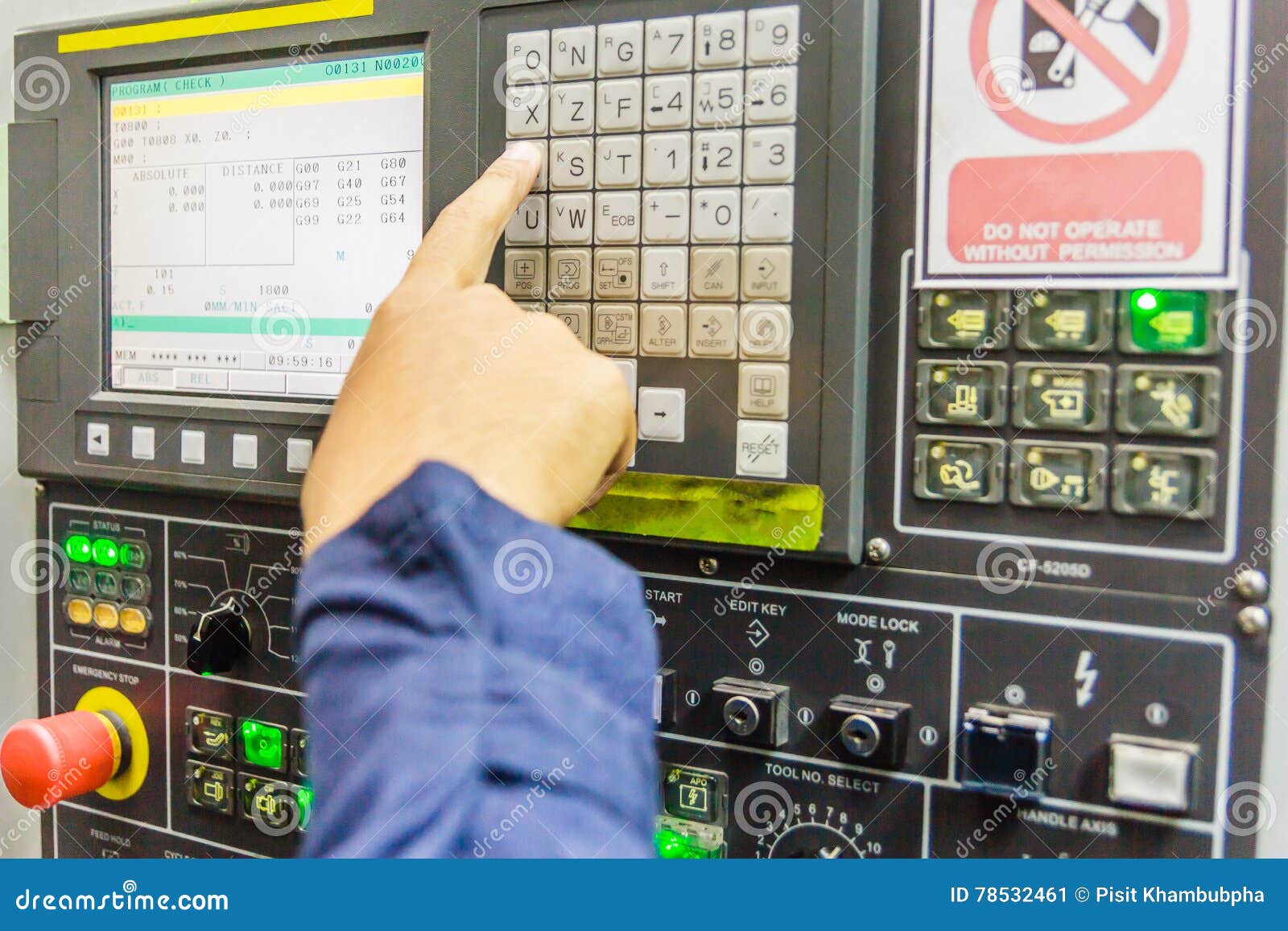 Mechanical Technician Working with Control Panel of CNC Machine Center ...