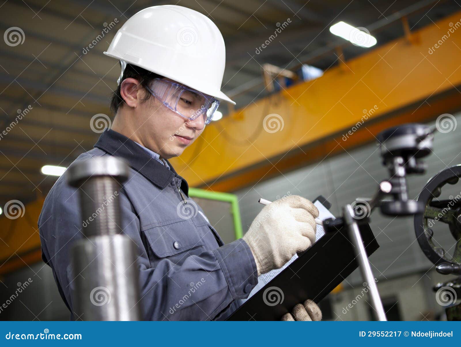 Mechanical Technician Writing on Notepad Stock Image - Image of person ...