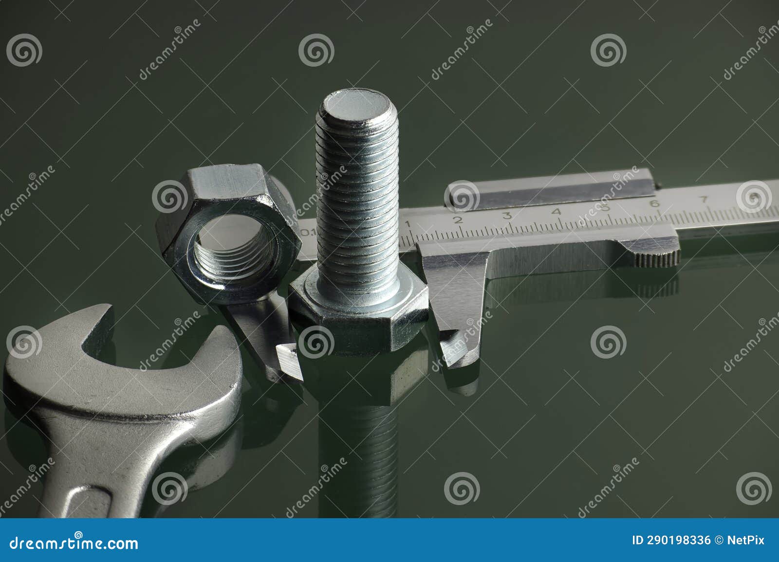 Mechanical Tools and Fasteners on Reflective Surface Stock Photo ...