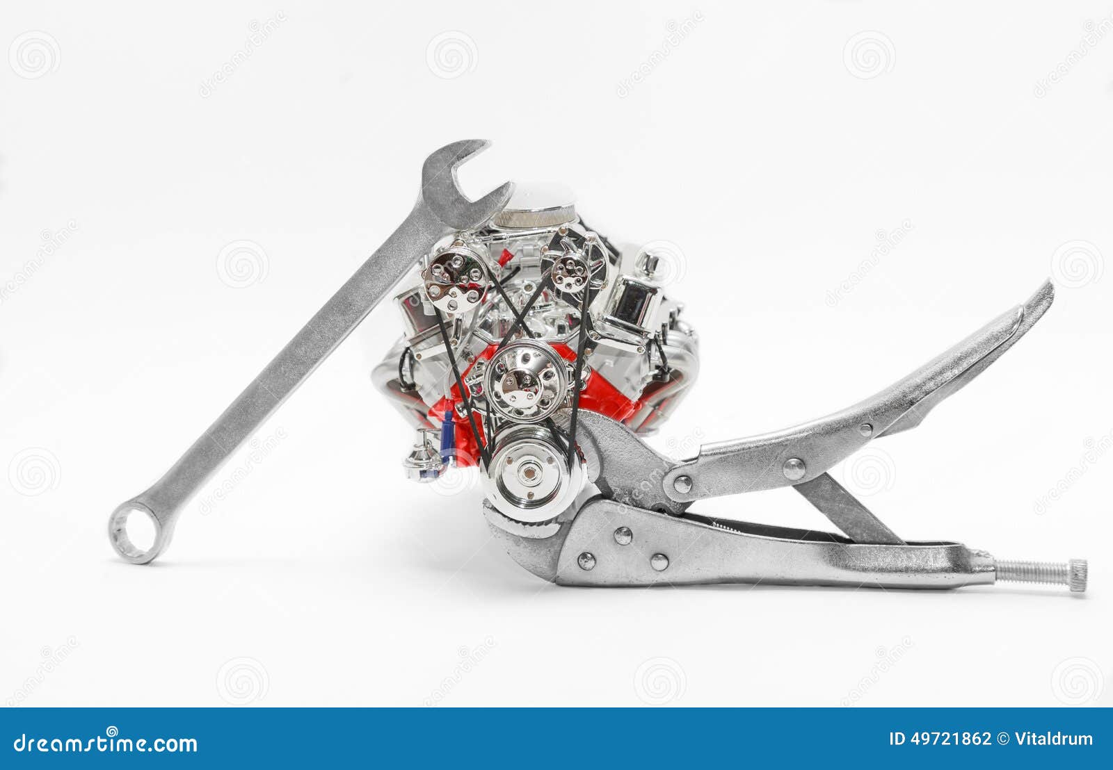 Mechanical Tools on Miniature Truck Engine Model Against Light Grey ...